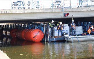 90T cycle bridge floated into position using inflatable buoyancy units ...